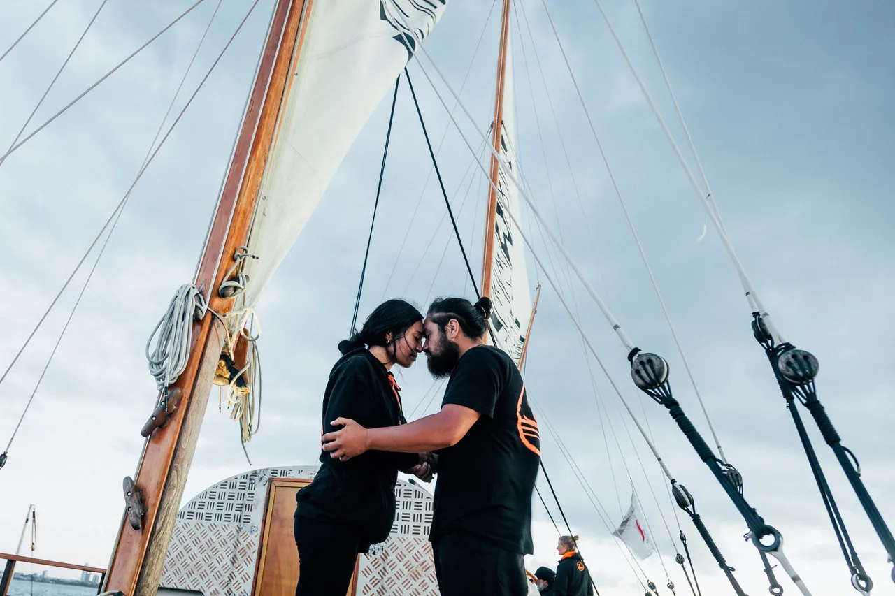 Auckland Brand Library - Wāhine and tāne performing a hongi