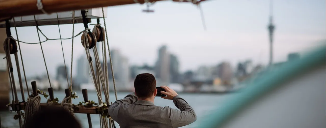 Auckland Brand Library - Sunset sailing on ted ashby with sky tower in ...
